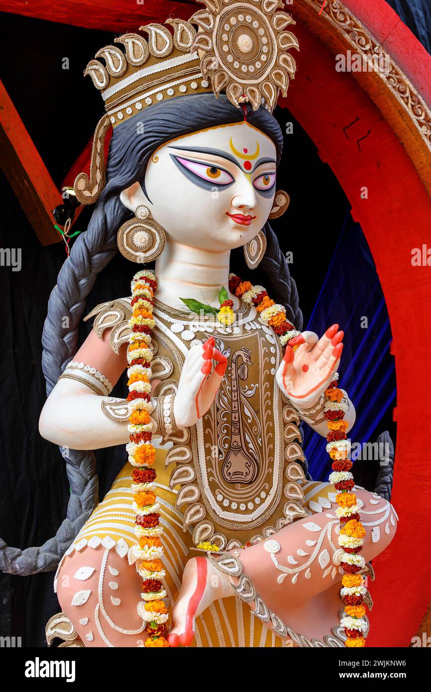Idol of Goddess Devi Saraswati at a decorated puja pandal in Kolkata ...