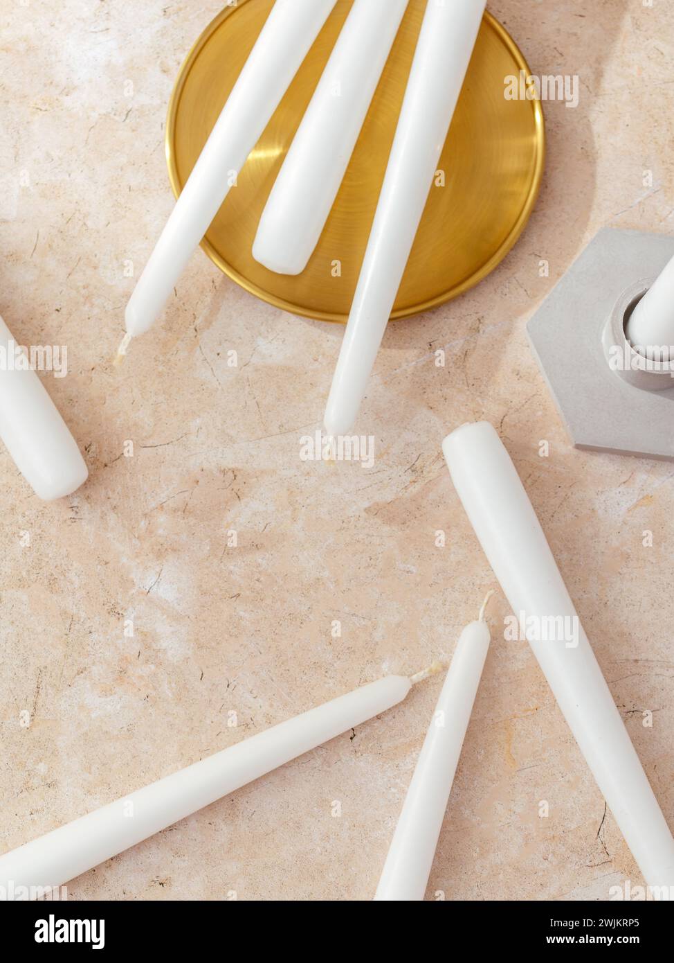 whole candles are lying on the table Stock Photo - Alamy