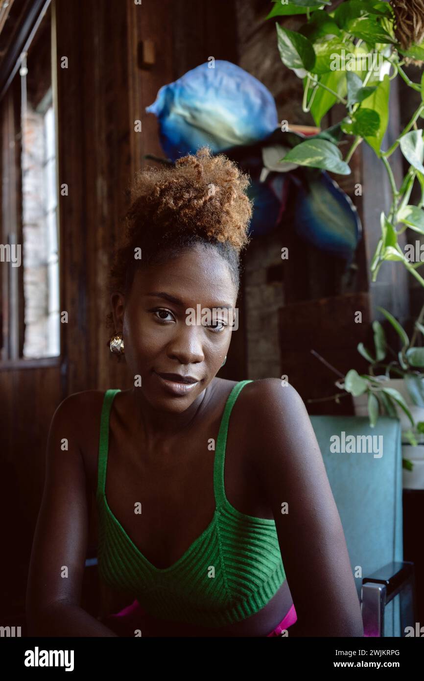 Leaning toward camera hi-res stock photography and images - Alamy