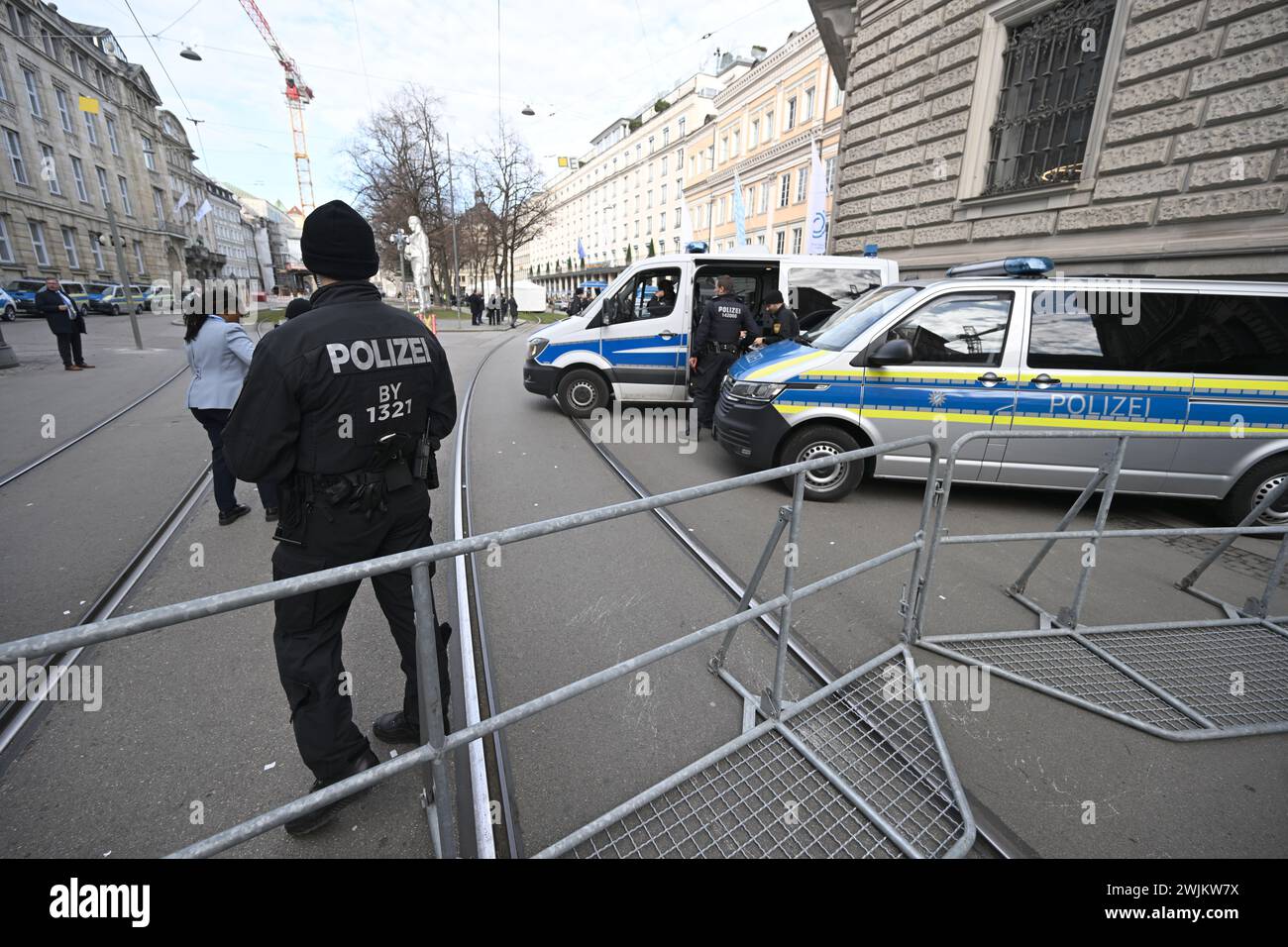 Munich, Germany. 16th Feb, 2024. A police officer cordons off the ...