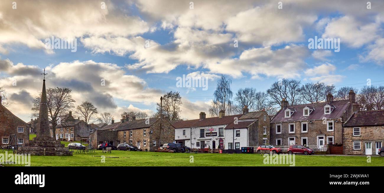 Centre of West Burton with domestic houses, the Fox & Hounds pub, the ...