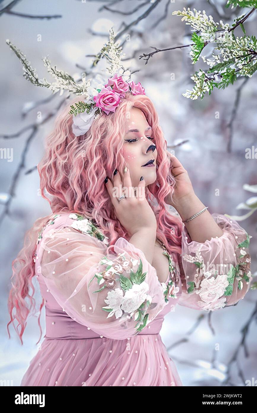 A beautiful spring fairy, a dryad with deer antlers and a crown and a ...