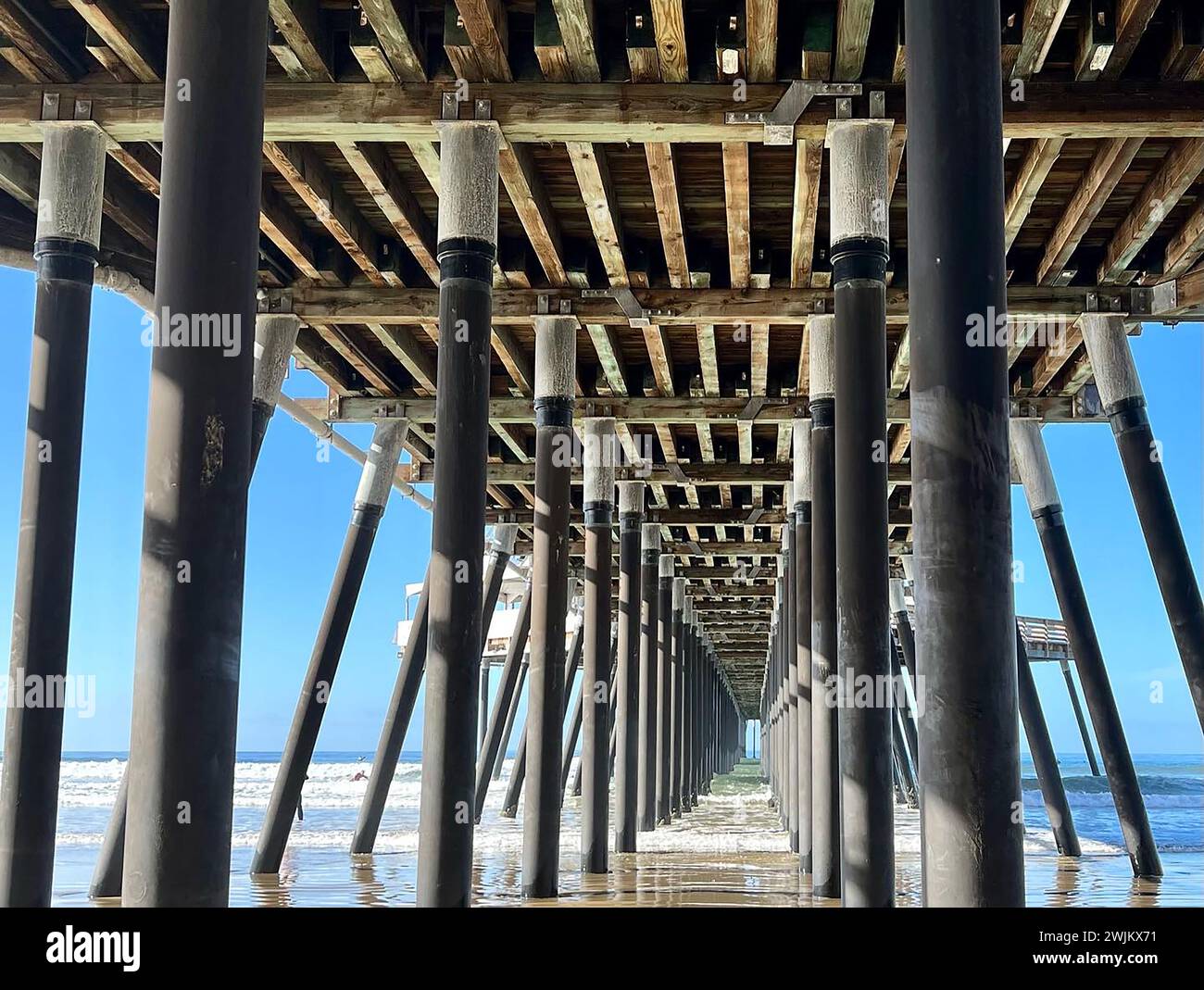 Looking under the Pismo Beach pier Stock Photo - Alamy