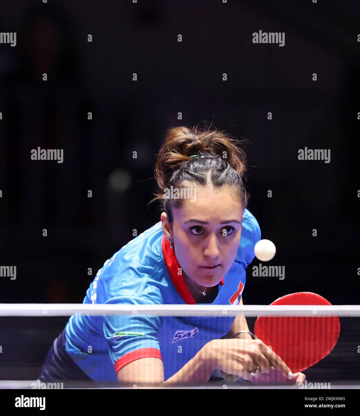 Busan, South Korea. 16th Feb, 2024. Manika Batra of India hits a return against Sun Yingsha of ...