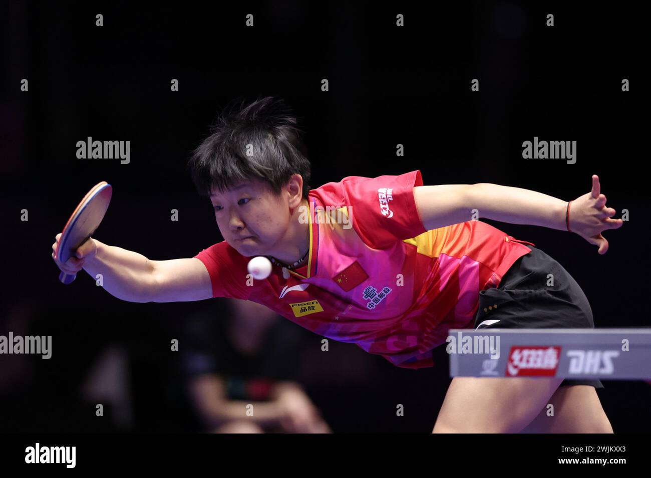 Busan, South Korea. 16th Feb, 2024. Sun Yingsha of China hits a return against Ayhika Mukherjee ...