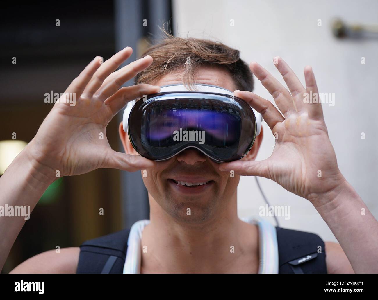 James Griffith wearing his Apple Vision Pro mixed reality headset ...