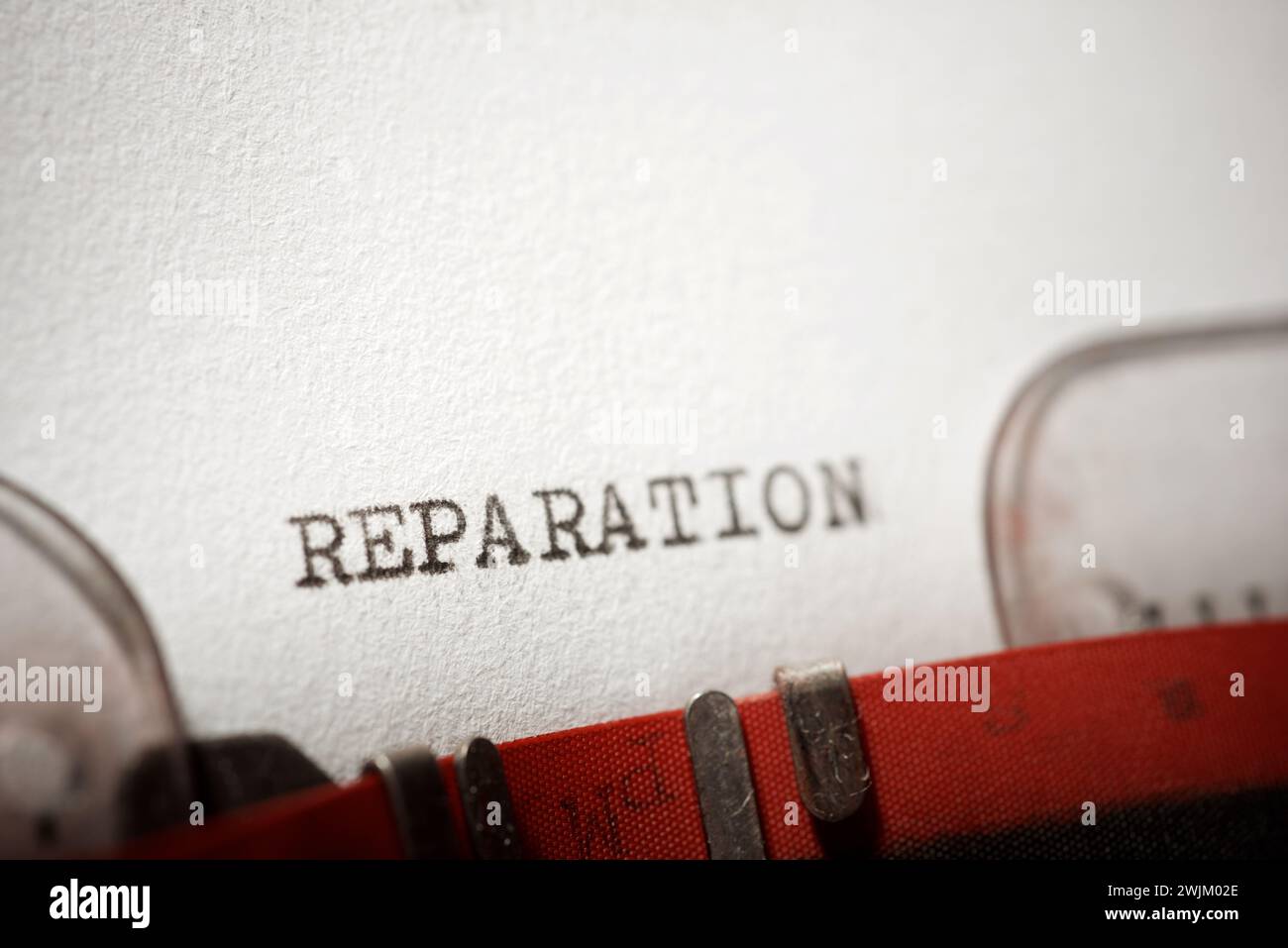 Reparation word written with a typewriter Stock Photo - Alamy