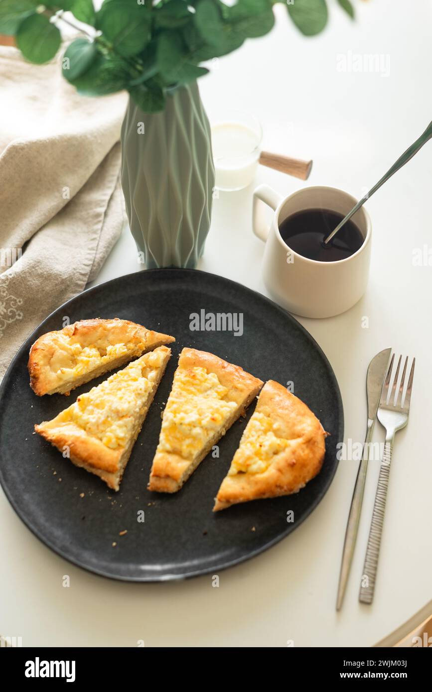 traditional Georgian cuisine. Open pie with mozzarella cheese. Ajara ...