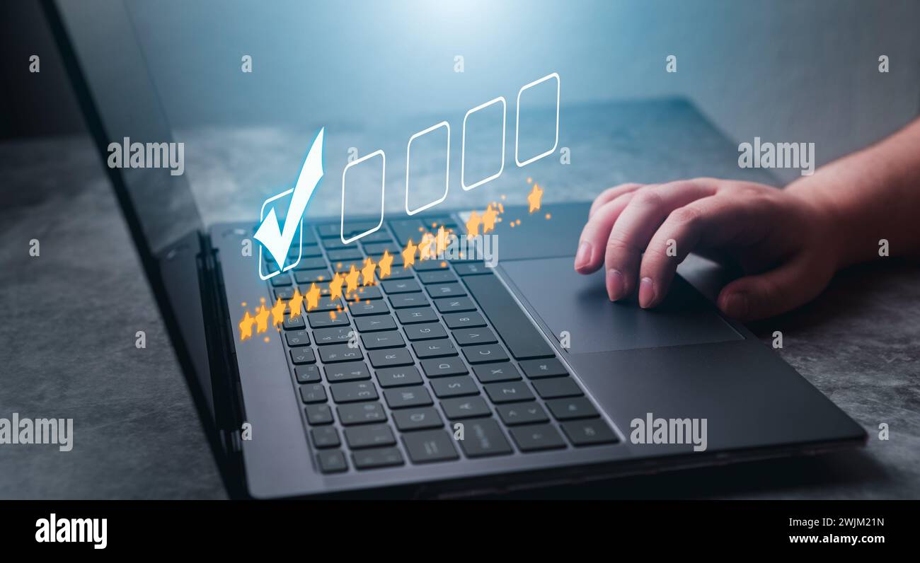 Woman use laptop to rate a service online. Customer review concept ...