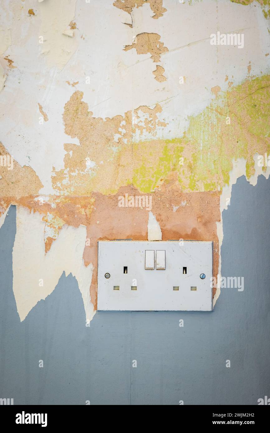 White plug socket closeup during room renovation in england uk Stock ...