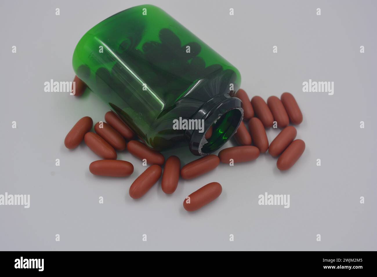 Medicine, pills, medicines, green jar with expensive vitamins filled ...