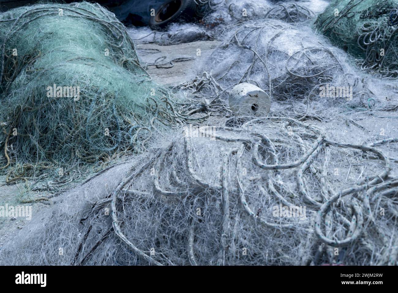 Neglected fishing nets Stock Photo - Alamy