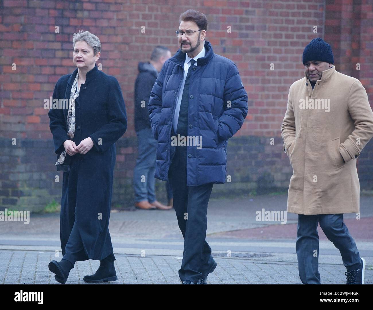 Yvette Cooper (left) arrives for a Requiem Mass for former Rochdale MP ...