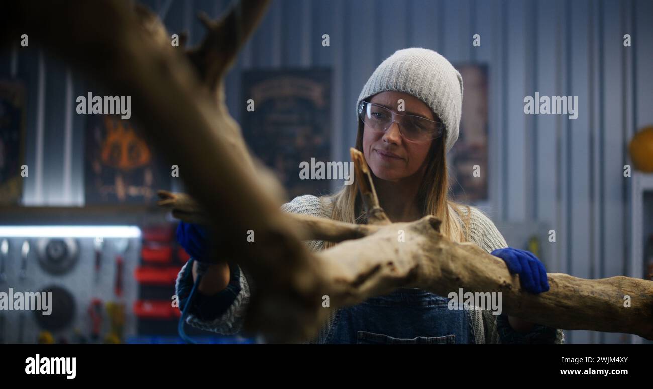 Female woodworker using grinder in hi-res stock photography and images ...