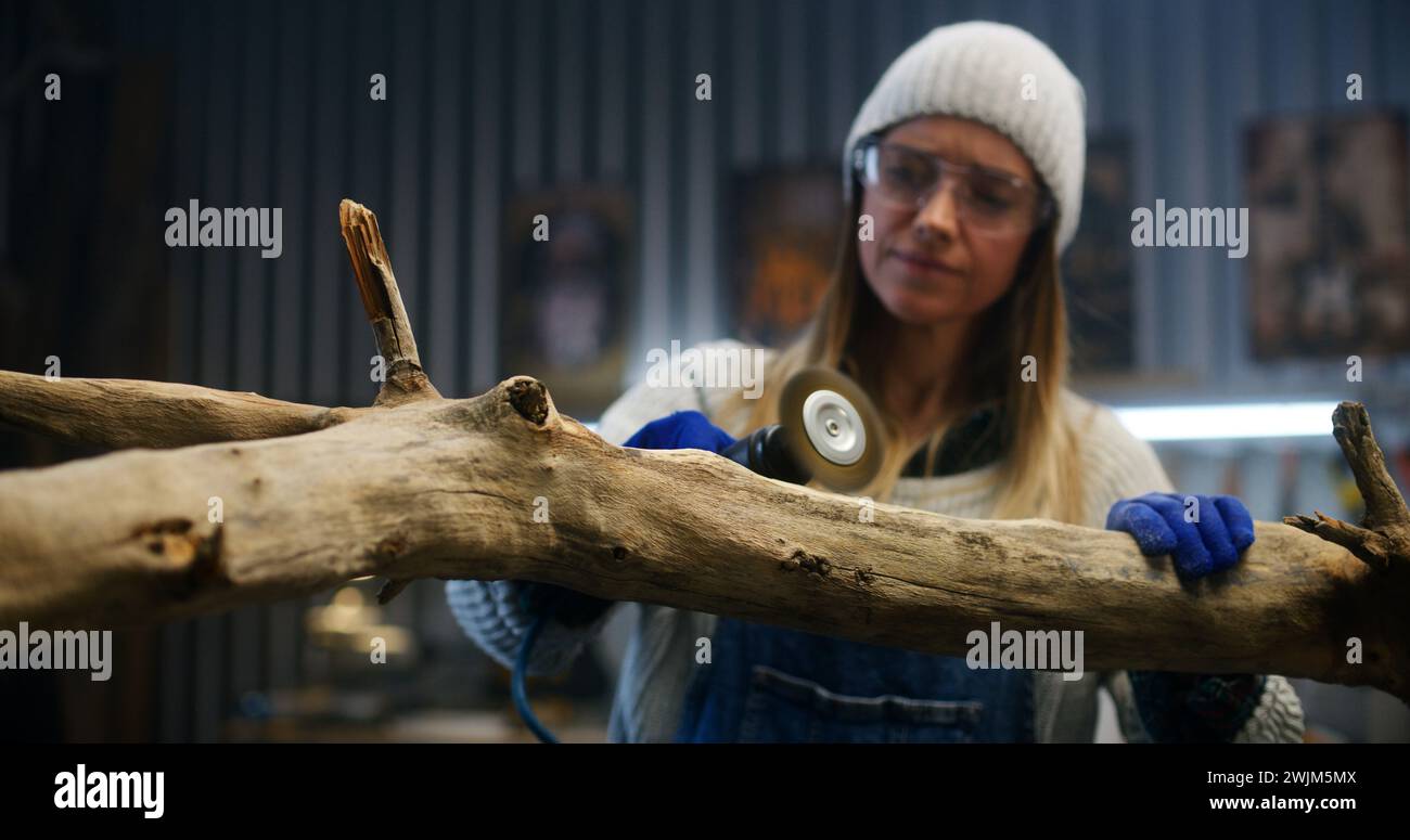 Female woodworker using grinder in hi-res stock photography and images ...