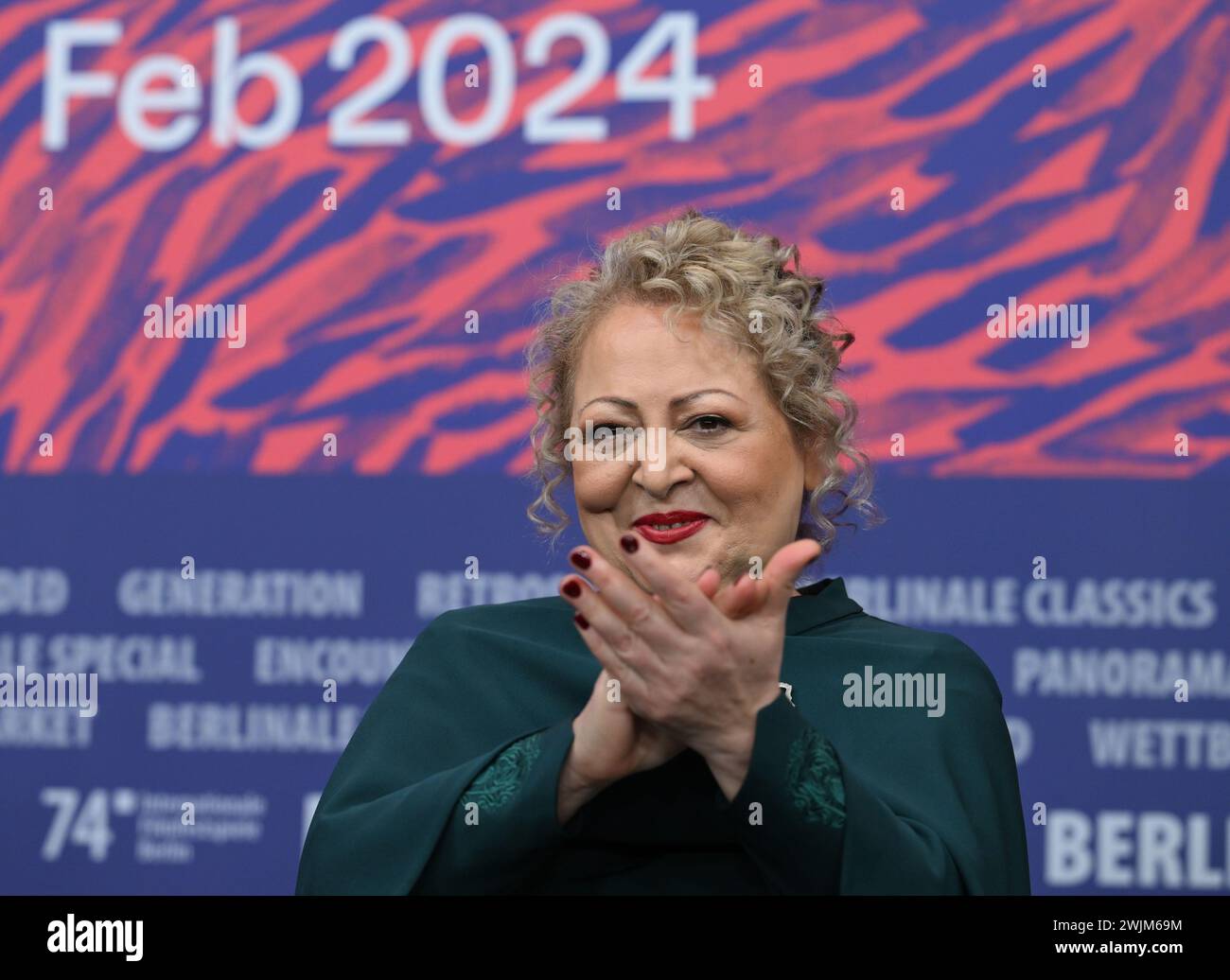 Berlin, Germany. 16th Feb, 2024. Actress Lily Farhadpour applauds the ...