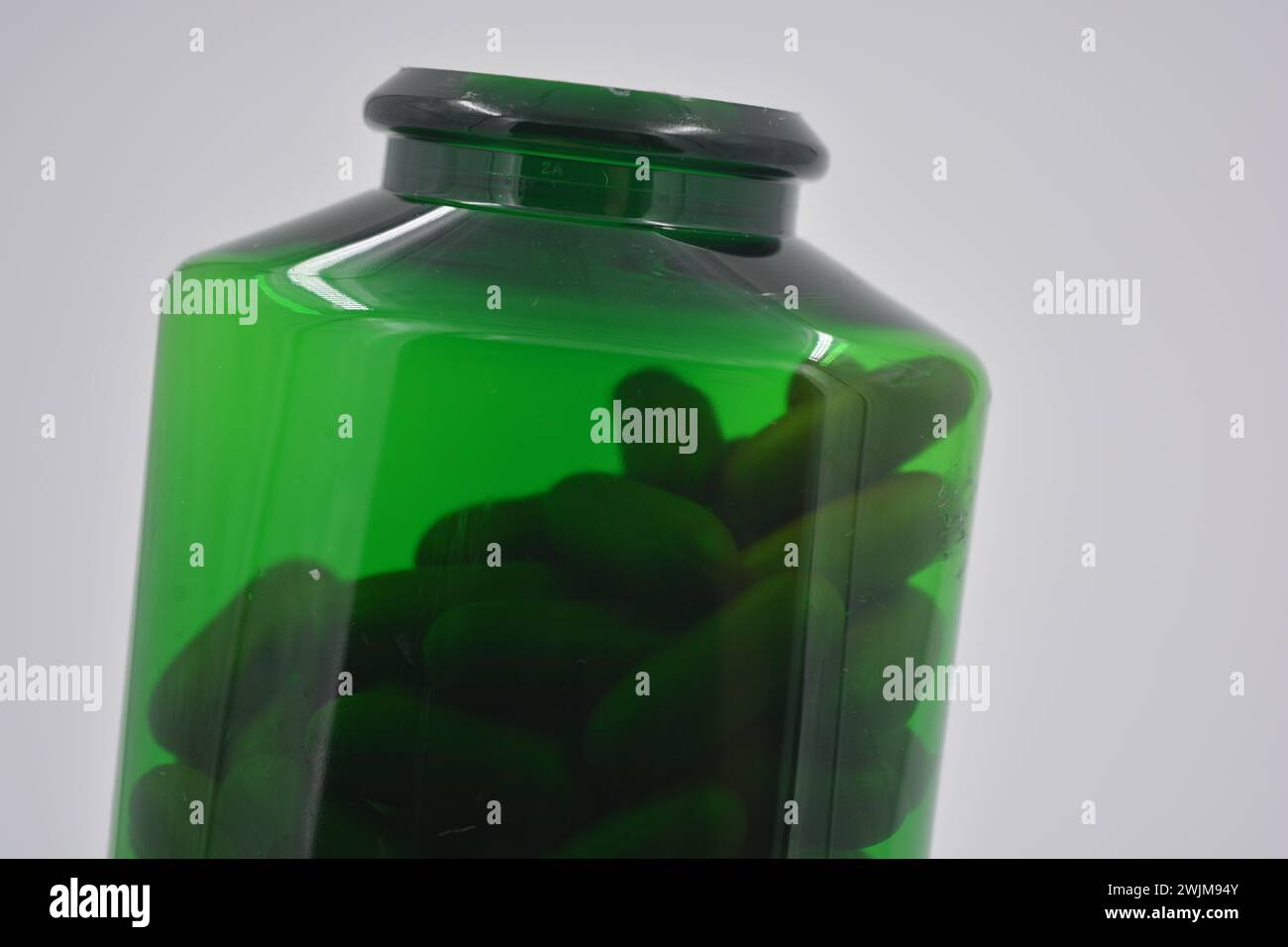 Medicine, pills, medicines, green jar with expensive vitamins filled ...