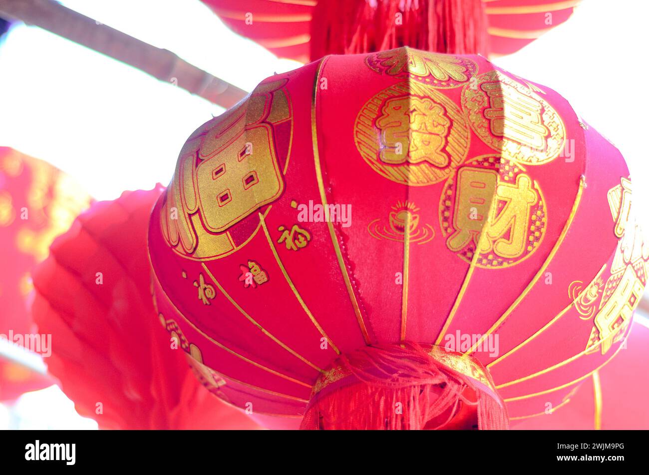 The traditional Chinese red lanterns hanging in front of people’s house ...