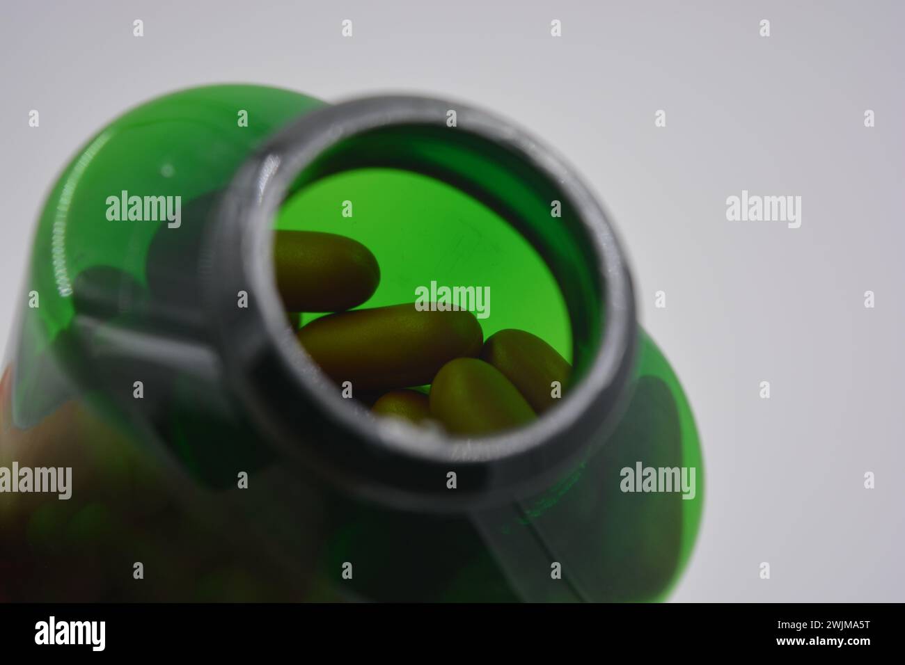 Medicine, pills, medicines, green jar with expensive vitamins filled ...