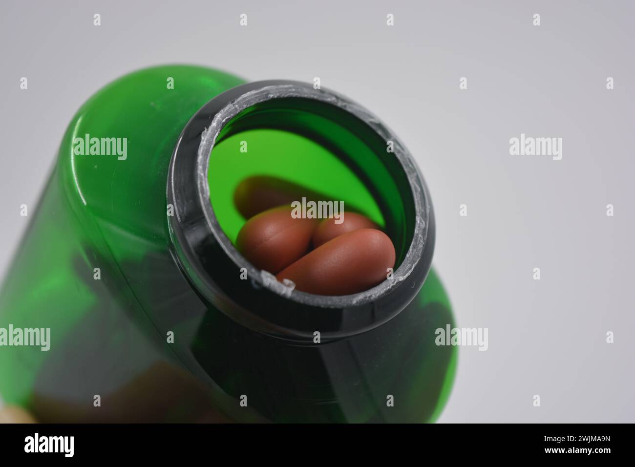 Medicine, pills, medicines, green jar with expensive vitamins filled ...