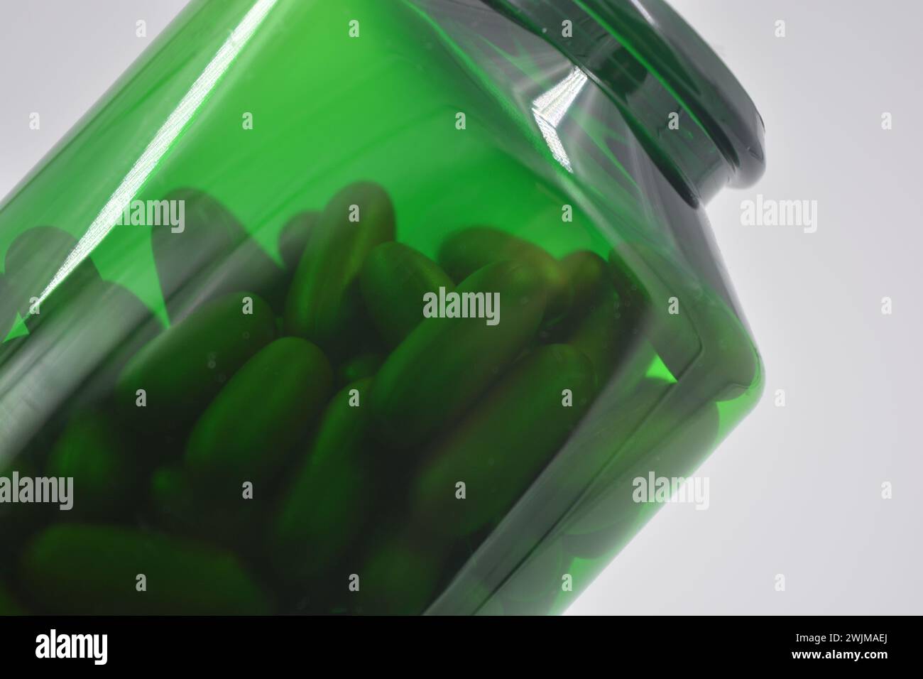 Medicine, pills, medicines, green jar with expensive vitamins filled ...