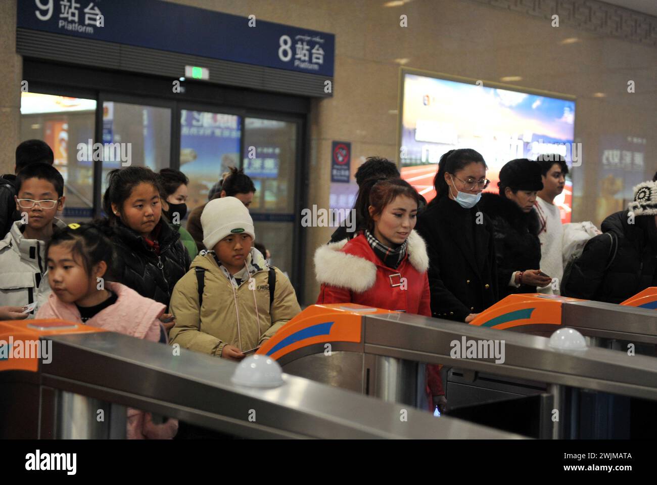 URUMQI, CHINA - FEBRUARY 16, 2024 - Tourists ride a train back to ...