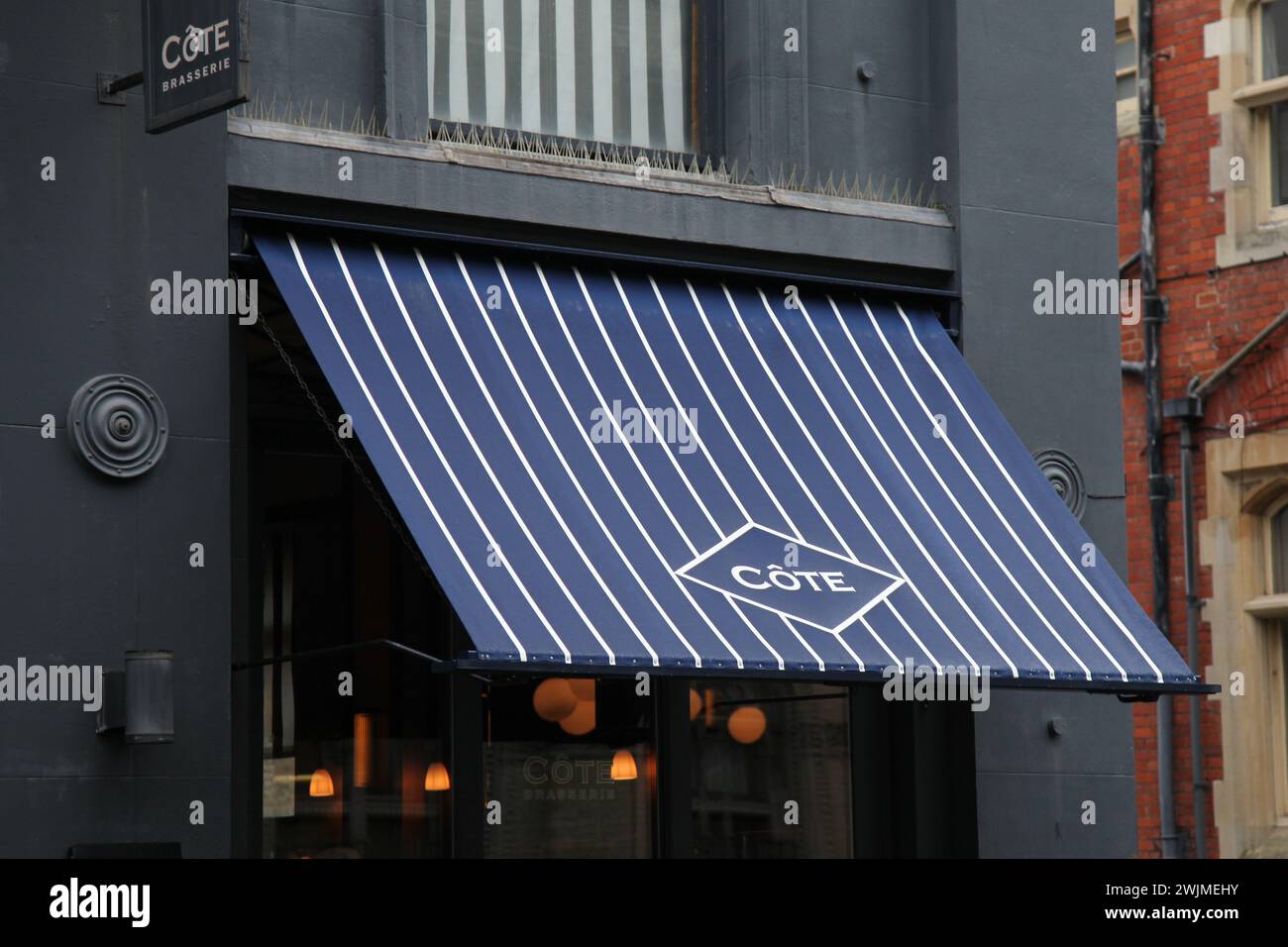 Côte Brasserie cafe restaurant awning, Brighton, England, UK, Feb 2024 ...