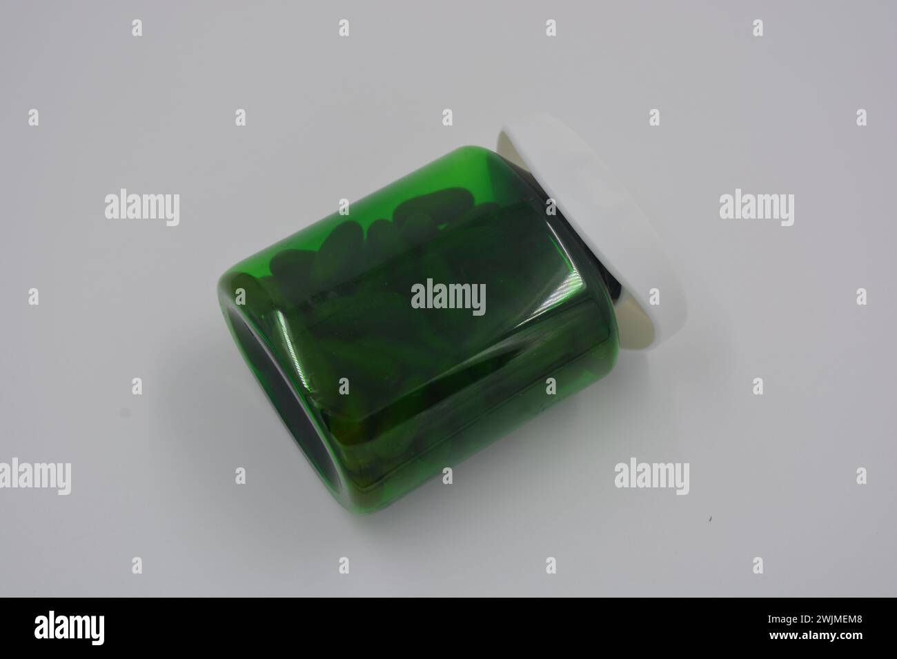 Medicine, pills, medicines, green jar with expensive vitamins filled ...