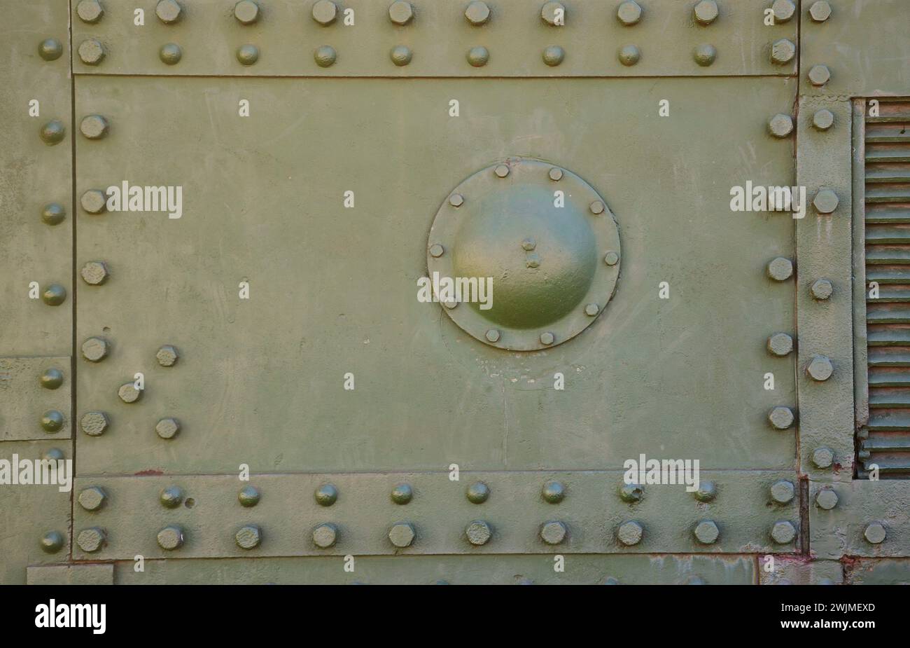 The texture of the wall of the tank, made of metal and reinforced with ...