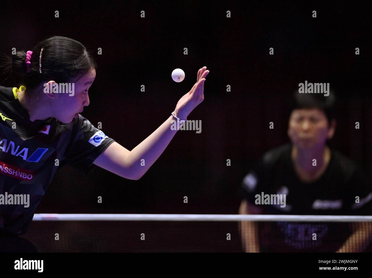 Busan, South Korea. 16th Feb, 2024. Harimoto Miwa of Japan serves the ball to Ni Xia Lian of ...
