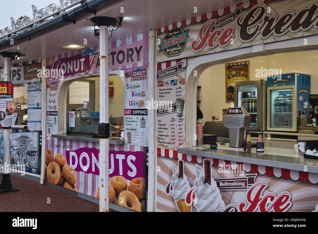 Traditional fast food kiosks on Brighton pier in winter Stock Photo - Alamy