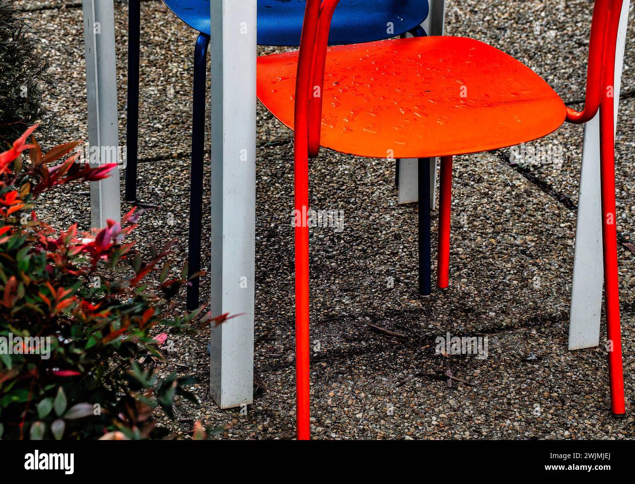 Metal table and chairs in a restaurant outdoor dining area Stock Photo ...