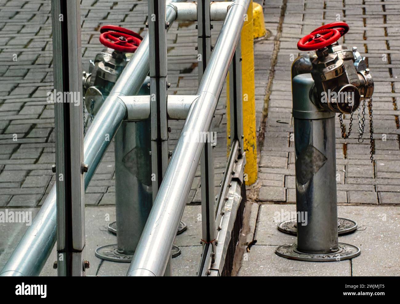 Building fire hydrant reflected in a glaas building wall Stock Photo ...