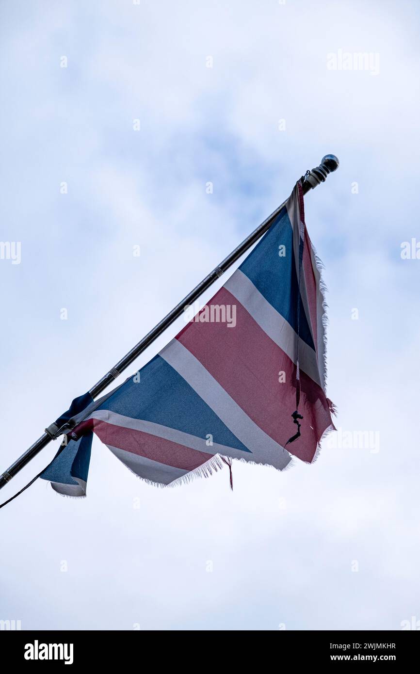 Wind damaged Union Jack Stock Photo - Alamy