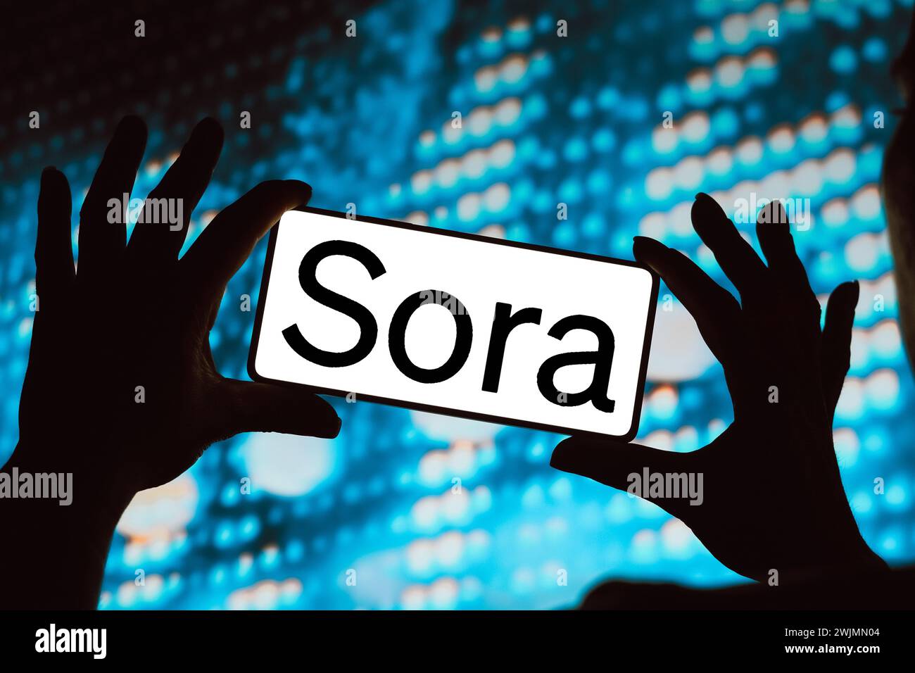 In this photo illustration, the Sora logo is displayed on a smartphone ...