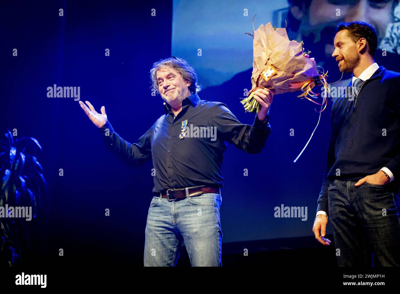 HILVERSUM - Eddy van Wessel receives a ribbon during the presentation ...