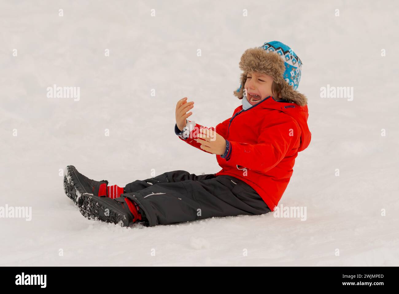 Cute boy crying with frozen hands, winter time childhood Stock Photo ...