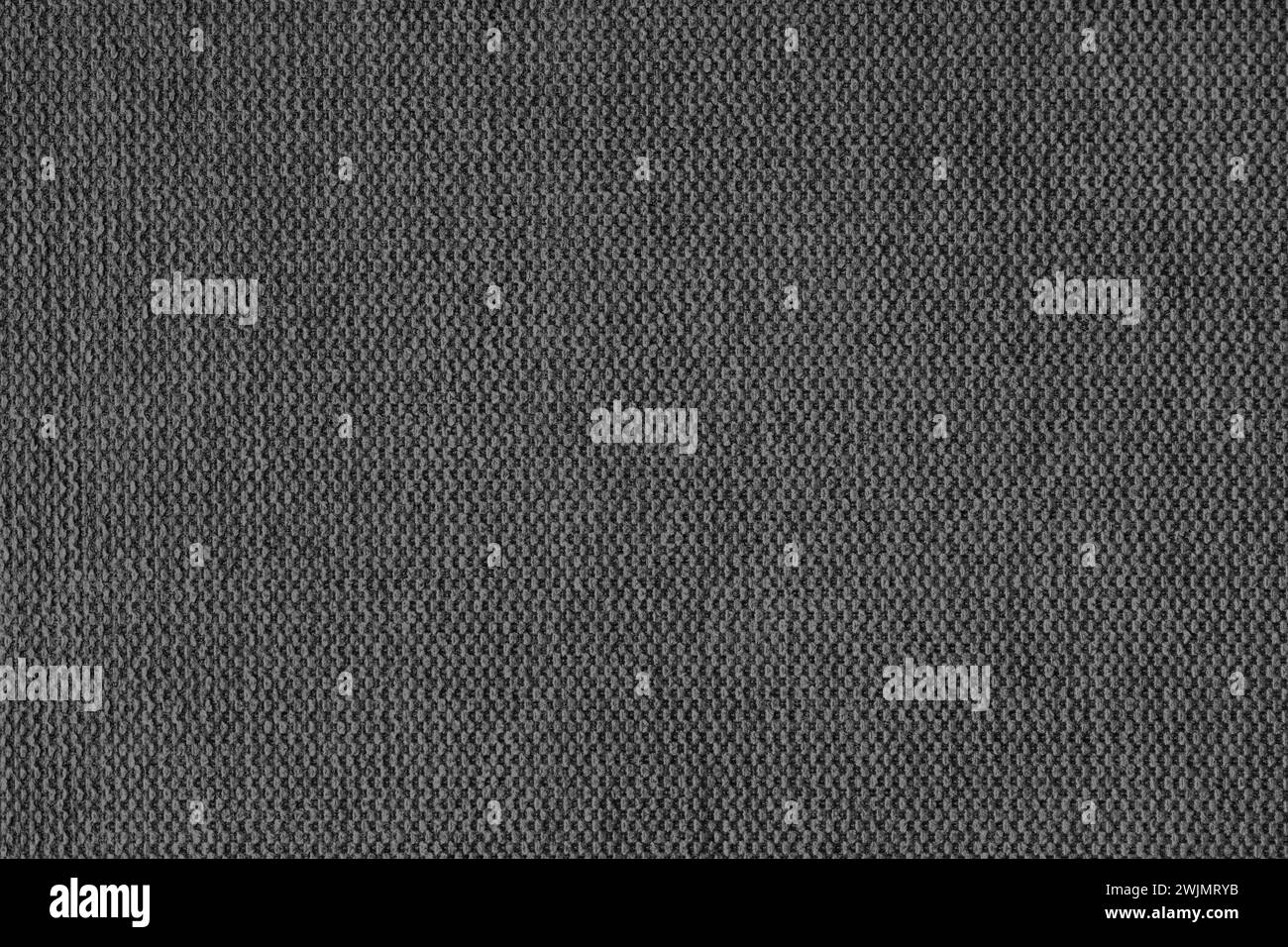 Textile background, black coarse fabric texture, cloth structure close ...