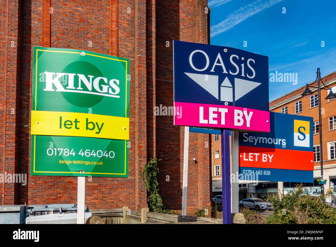 Estate agent signs outside a rental property Stock Photo - Alamy
