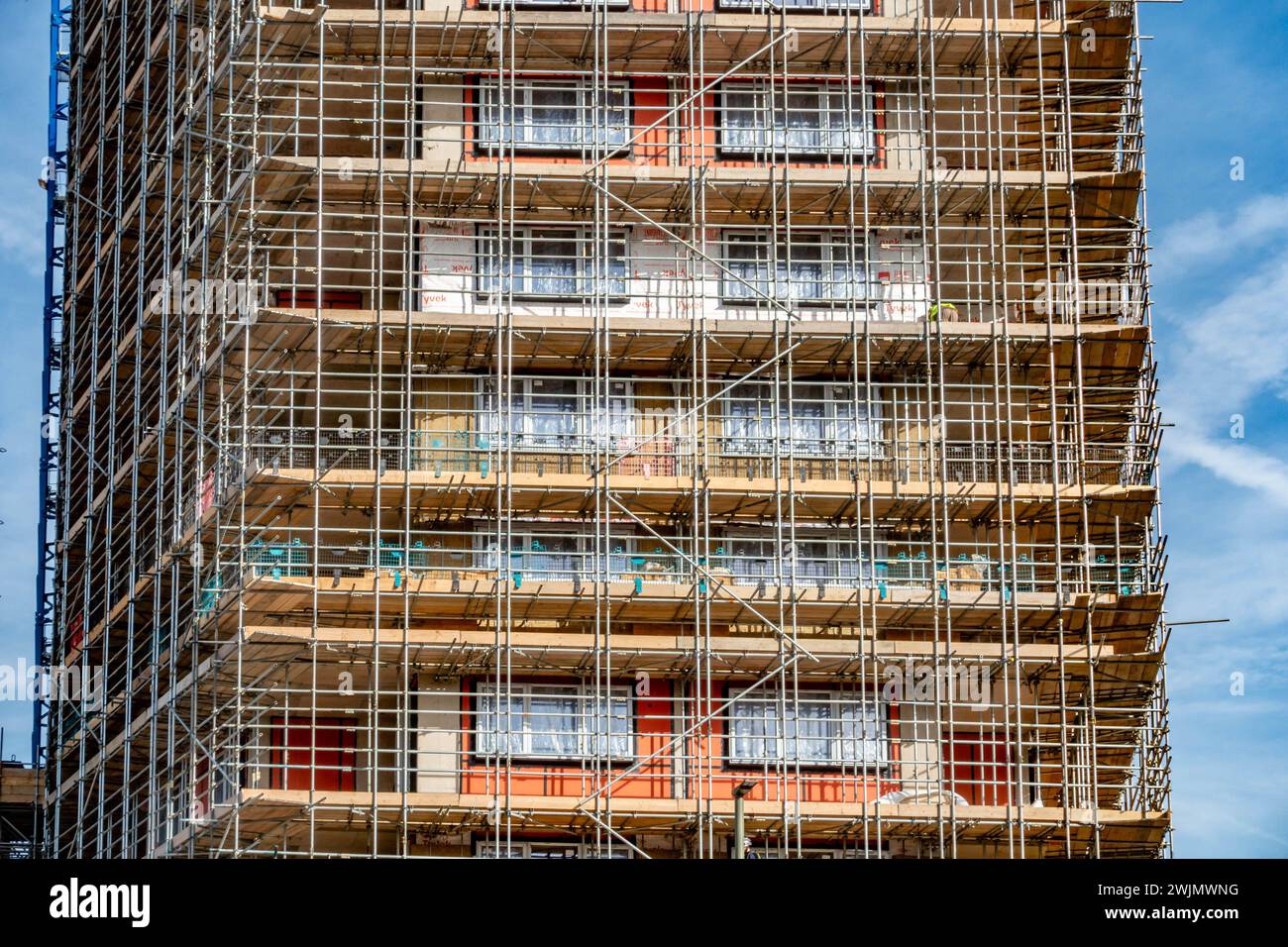 A new tower block under construction, surrounding by scaffolding in ...