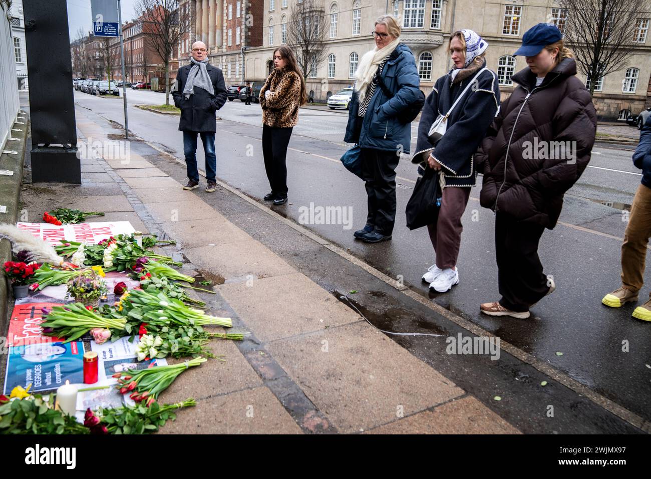 Flowers is placed and people gathers in front of the Russian embassy in ...