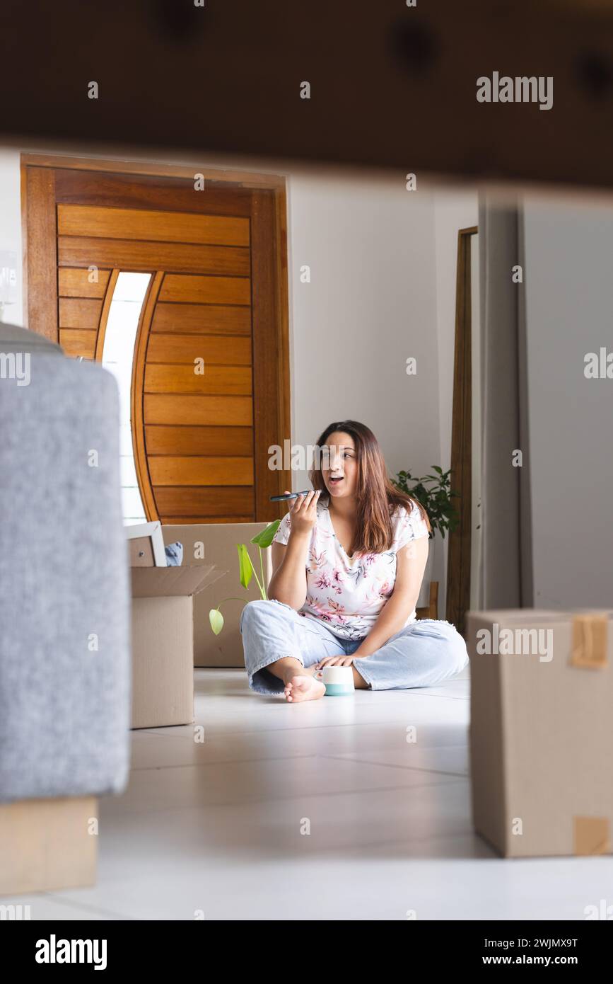 Person surrounded by boxes hi-res stock photography and images - Alamy