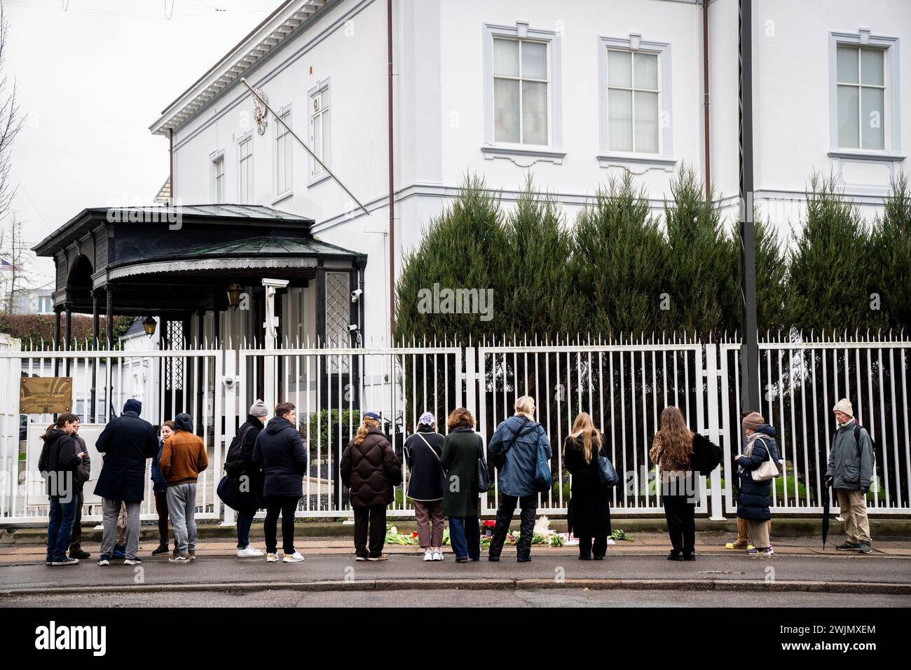 Flowers is placed and people gathers in front of the Russian embassy in ...