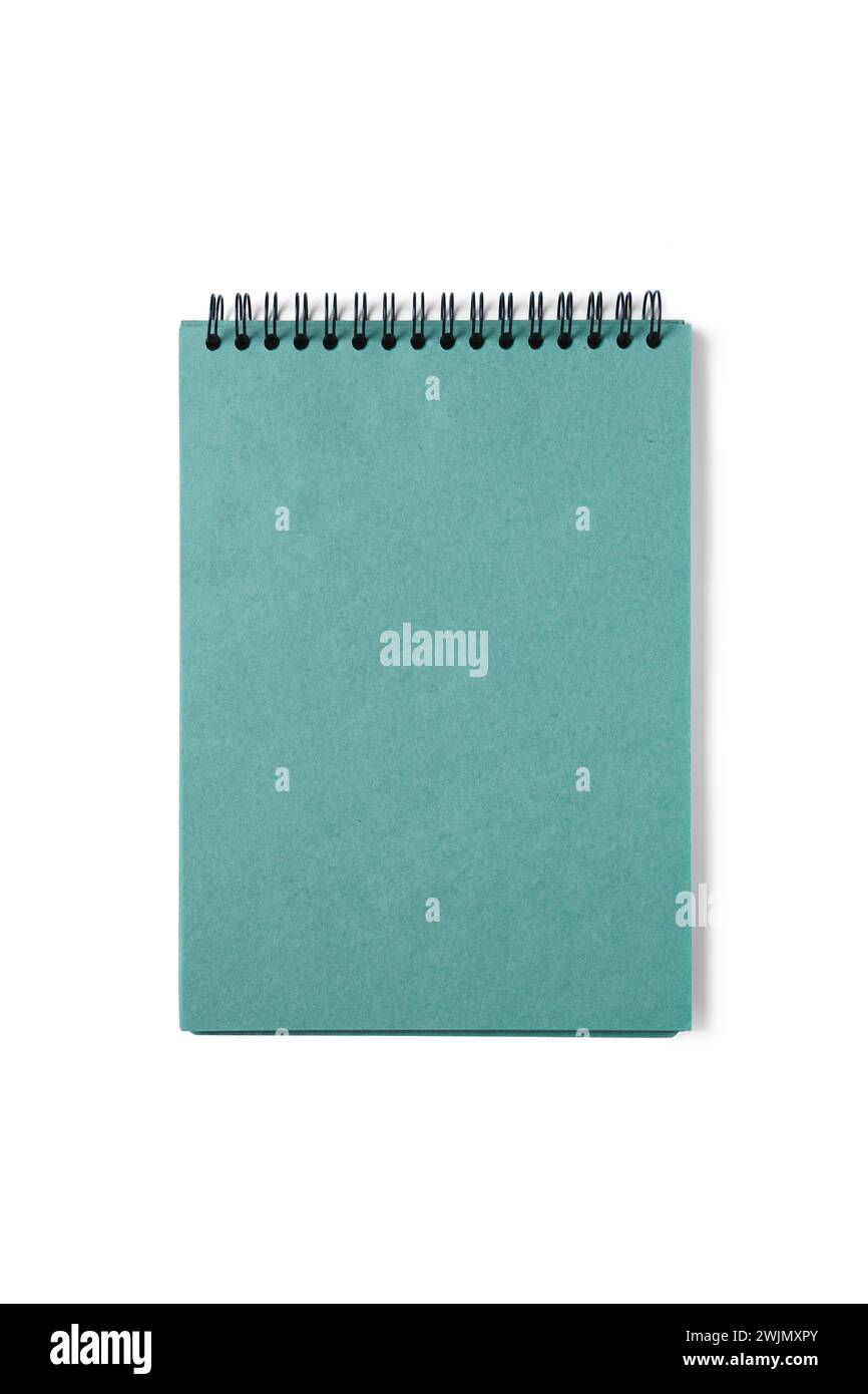 Open spiral bound notepad with craft turquoise sheets, isolated on ...