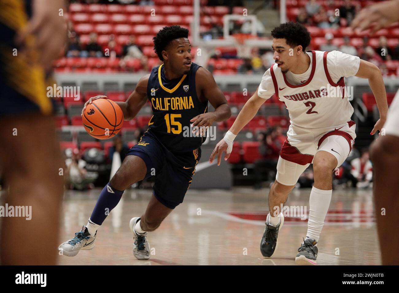 California guard Jalen Cone (15) drives while pressured by Washington ...