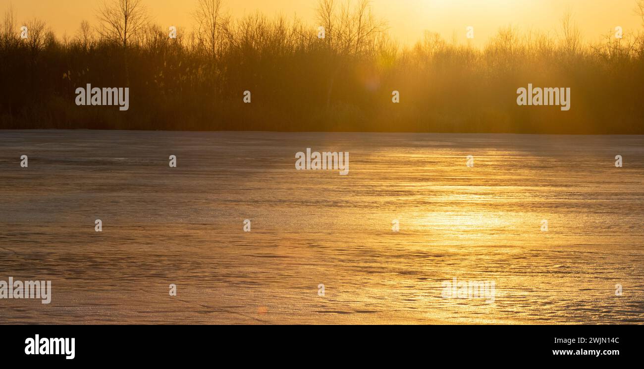 North-eastern European river after frosty winter. Porous ice began to ...