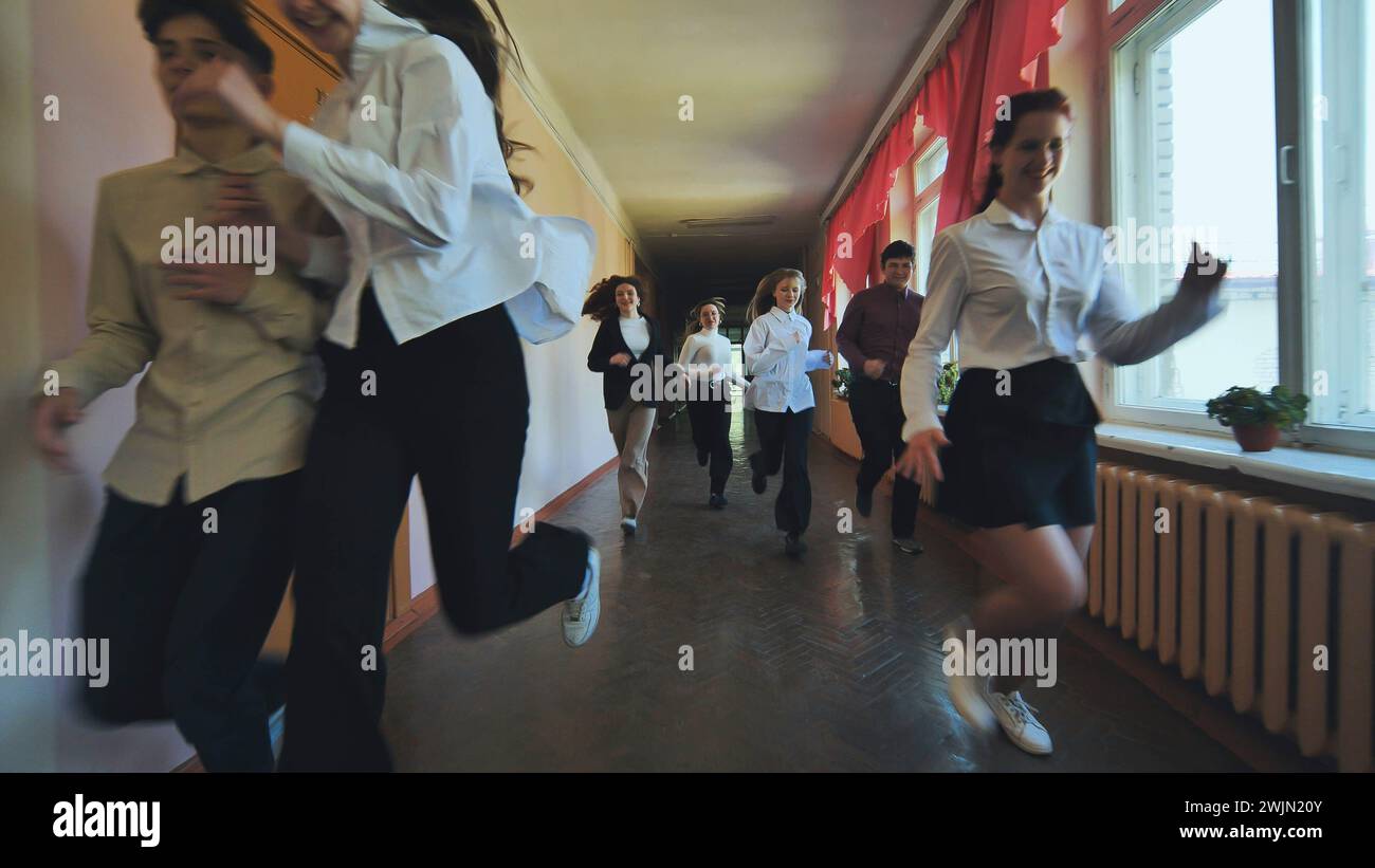 The students are running down the hallway of the school Stock Photo - Alamy