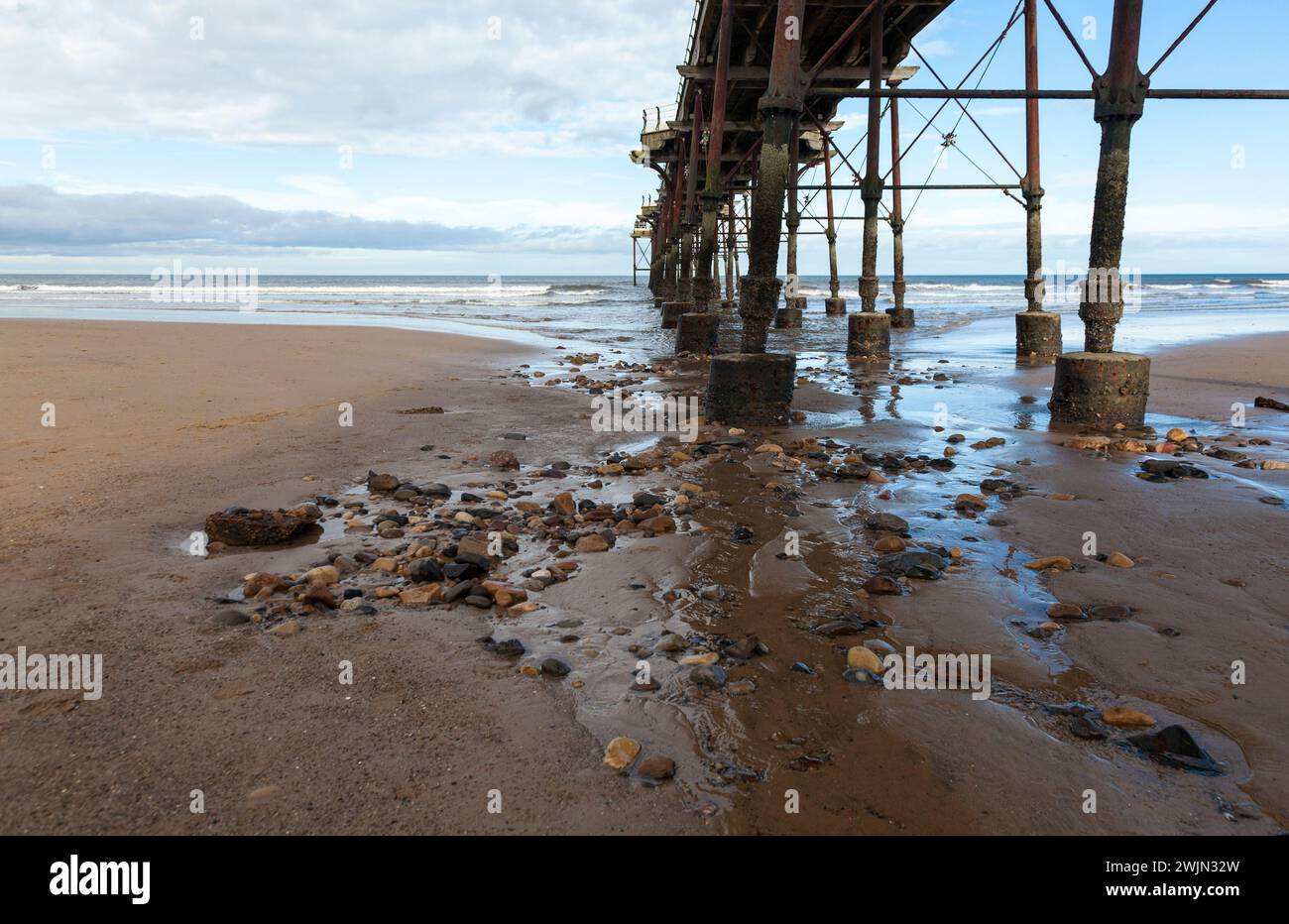 A view underneath and through the pier at Saltburn,England,UK showing ...