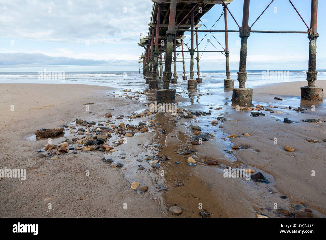 A view underneath and through the pier at Saltburn,England,UK showing ...