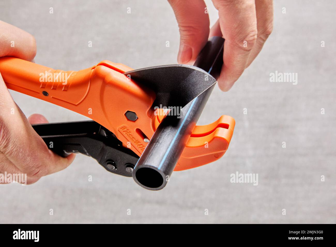 Using pipe cutter with ratcheting mechanism when installing sprinkler ...